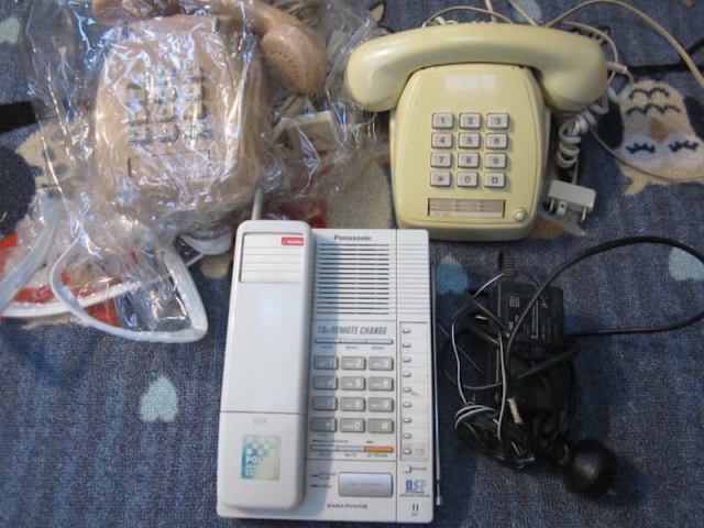 2 retro push button phones, pink cream a Panasonic remote phone/int ...