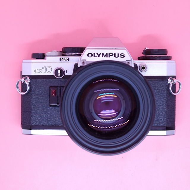 Olympus OM10 with 35-80mm zoom lens. Film Camera. 6 Month Warranty ...