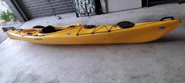 Sit in Seabird Expedition Kayak with padded seat & life jacket thrown ...