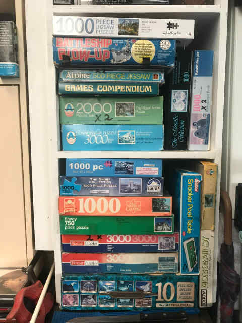 Jigsaw Puzzles over 50 all sizes some new plus some games $150 the lot ...