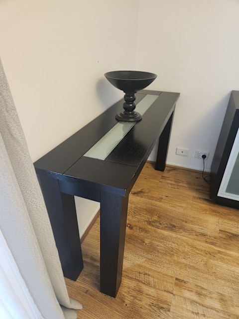Sleek, black console (hallway table) -Item Located In Skye, Vic. 3977 ...