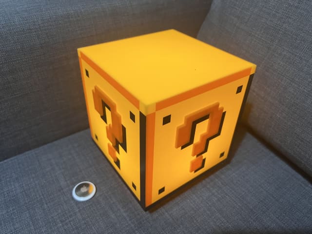 Super Mario cube. Lights up and makes sounds when you push it ...