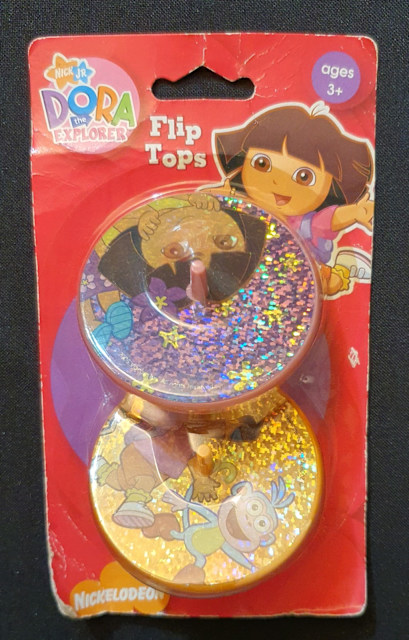 Nickelodeon Dora the Explorer kids birthday party favour spinning tops ...