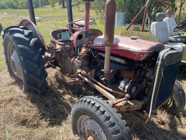 Ferguson 35 with rotary hoe, chisel plough, slasher , tow behind Auger ...