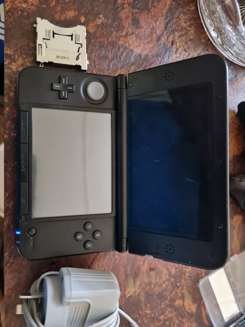 Nintendo 3ds xl for parts only (not working) + puzzle games - Video ...