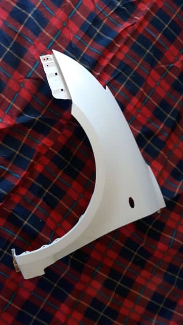 Suzuki swift 2009 left hand front guard in pearl white 5771173k00000 ...