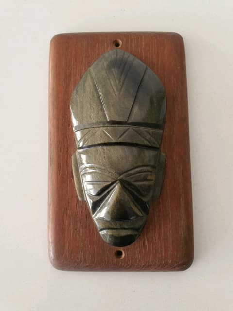 Gold sheen obsidian face wall plaque | Collectables | Gumtree Australia ...
