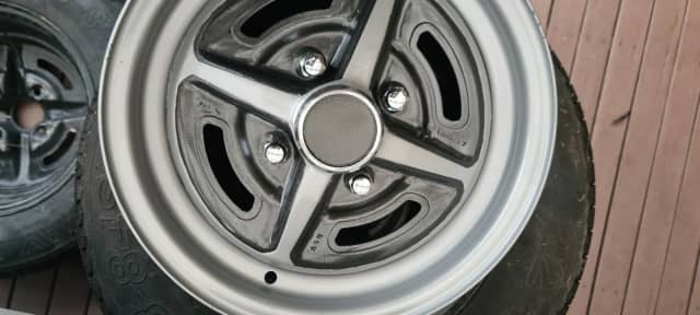 Rostyle Rim set 13x 5 (maybe 5.5)of five with caps and chrome lug nuts ...