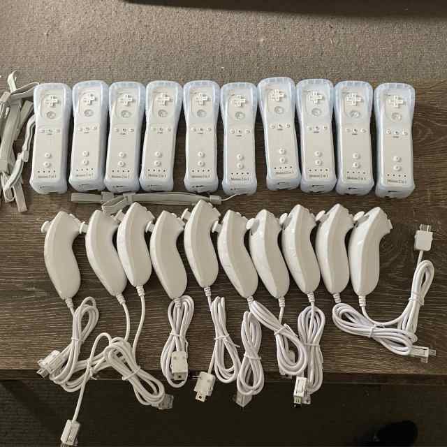 BRAND NEW Wii Remotes with Motion Plus and Nunchuks - Nintendo in ...