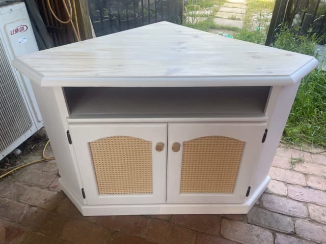 White Coastal Hampton style corner tv console unit cane rattan doors ...