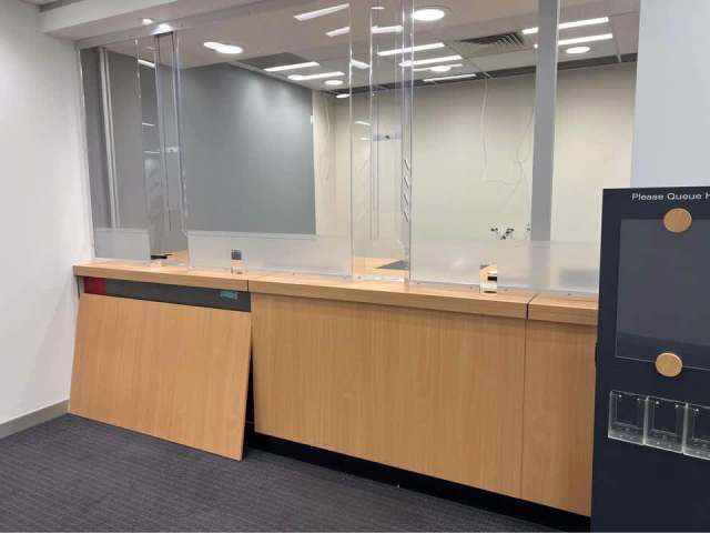 Ex Bank counter with hydroelectric rams for steel pop up screen inbuil ...