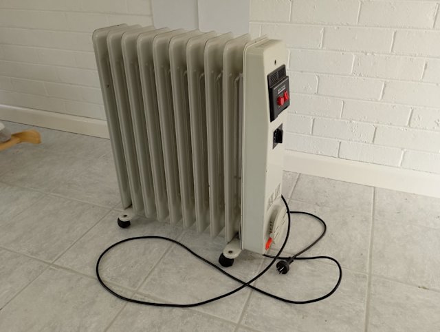 Oil heater warm and snuggly - Air Conditioning & Heating in Northcote ...