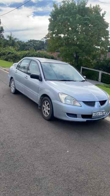 2004 MITSUBISHI LANCER LS 5 SP MANUAL 4D SEDAN | Cars, Vans & Utes ...