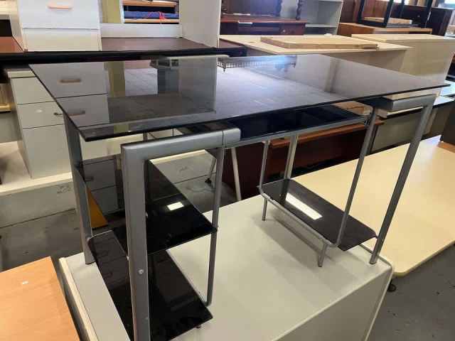 Unique Black glass single desk with pull out drawer and nice shelving ...